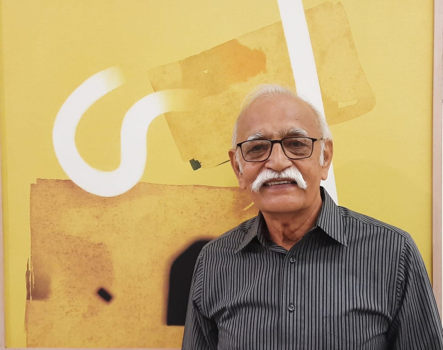 Amrut Patel with his favourite painting at the exhibition